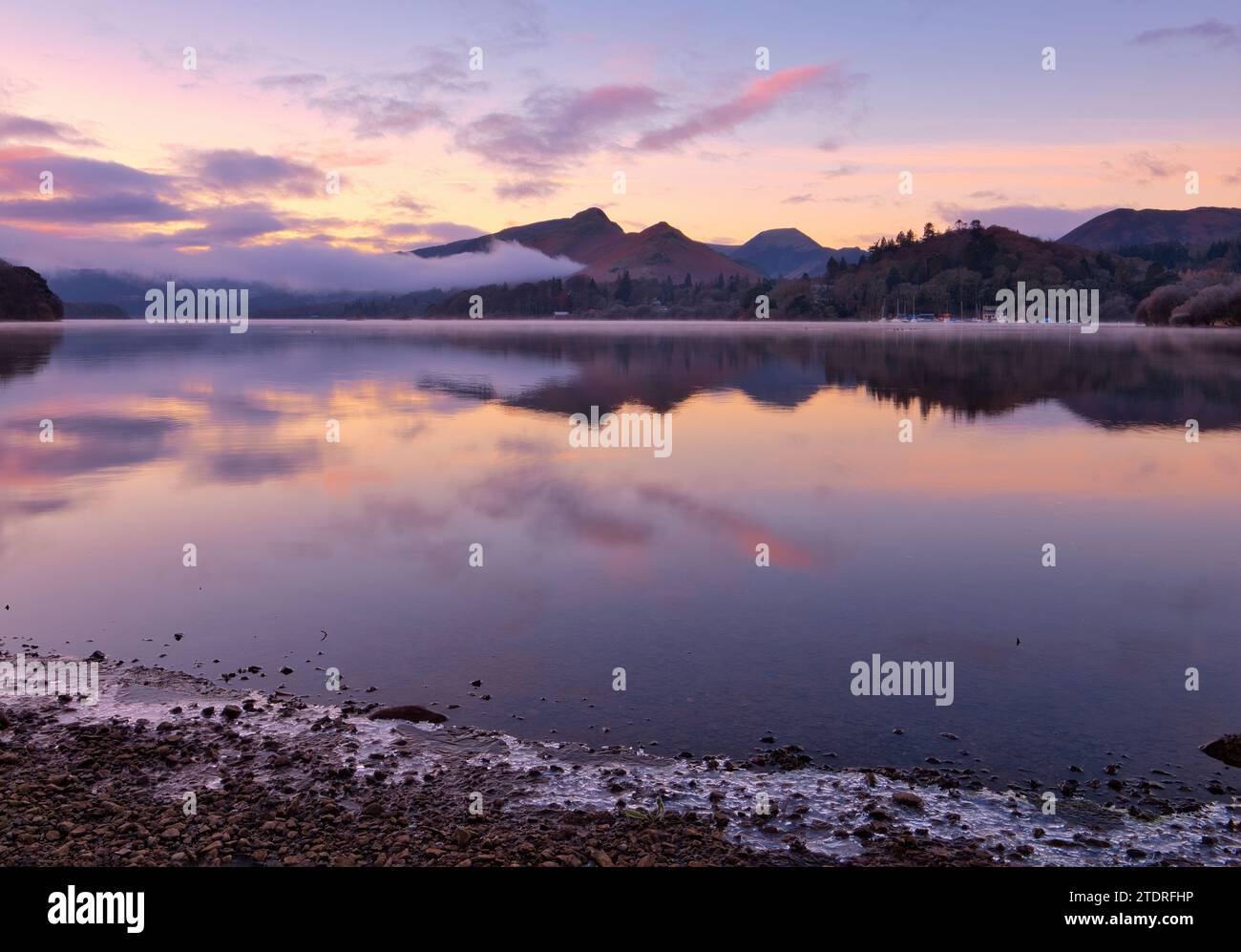 Golden morning skies contrast with the thick crust of ice around the ...