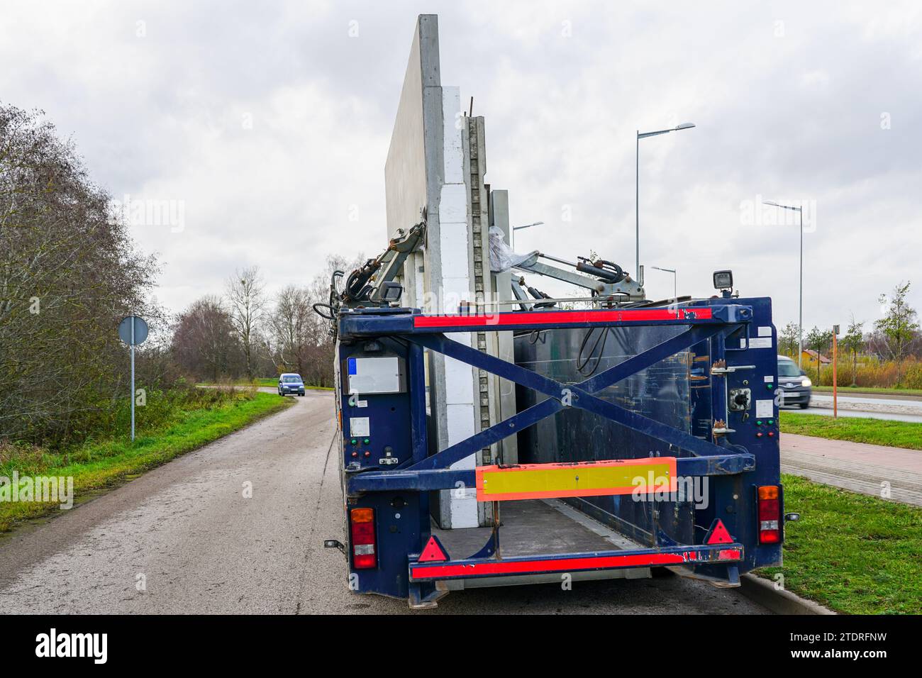 Transportation of reinforced concrete precast wall panels with a ...