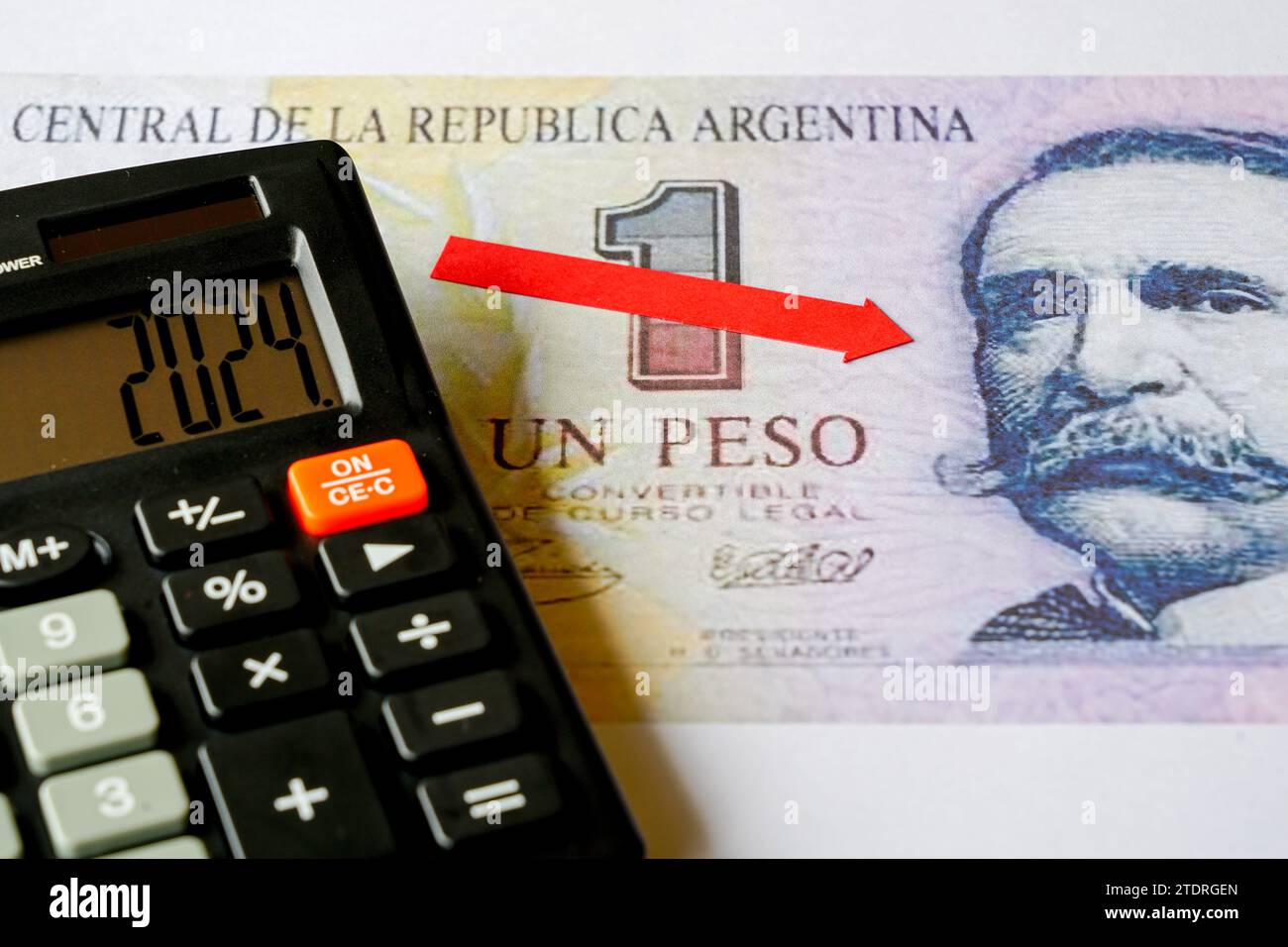 Concept of falling value of Argentine currency, symbol of rising ...