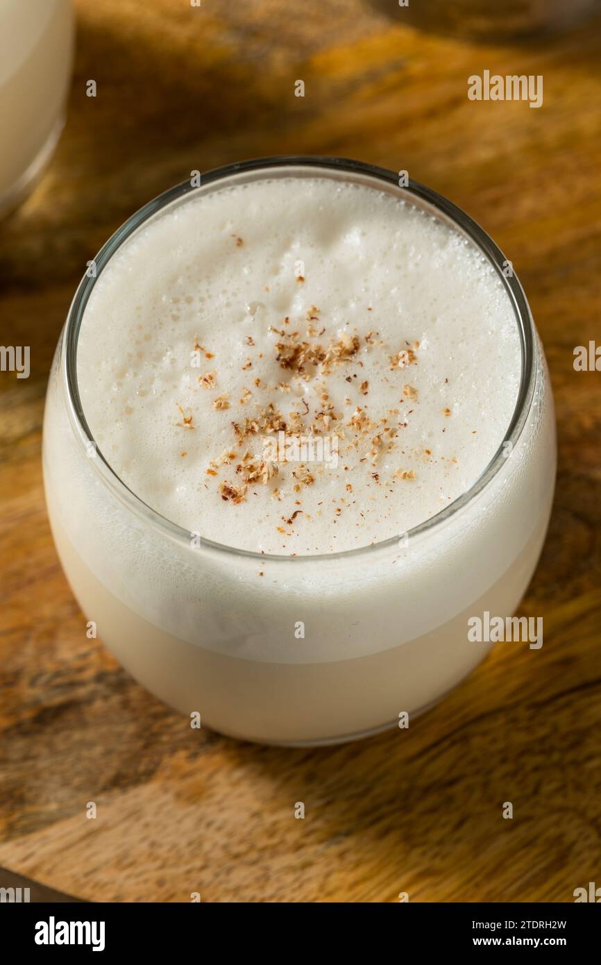 Boozy Cold Brandy Milk Punch Cocktail with Nutmeg Stock Photo - Alamy
