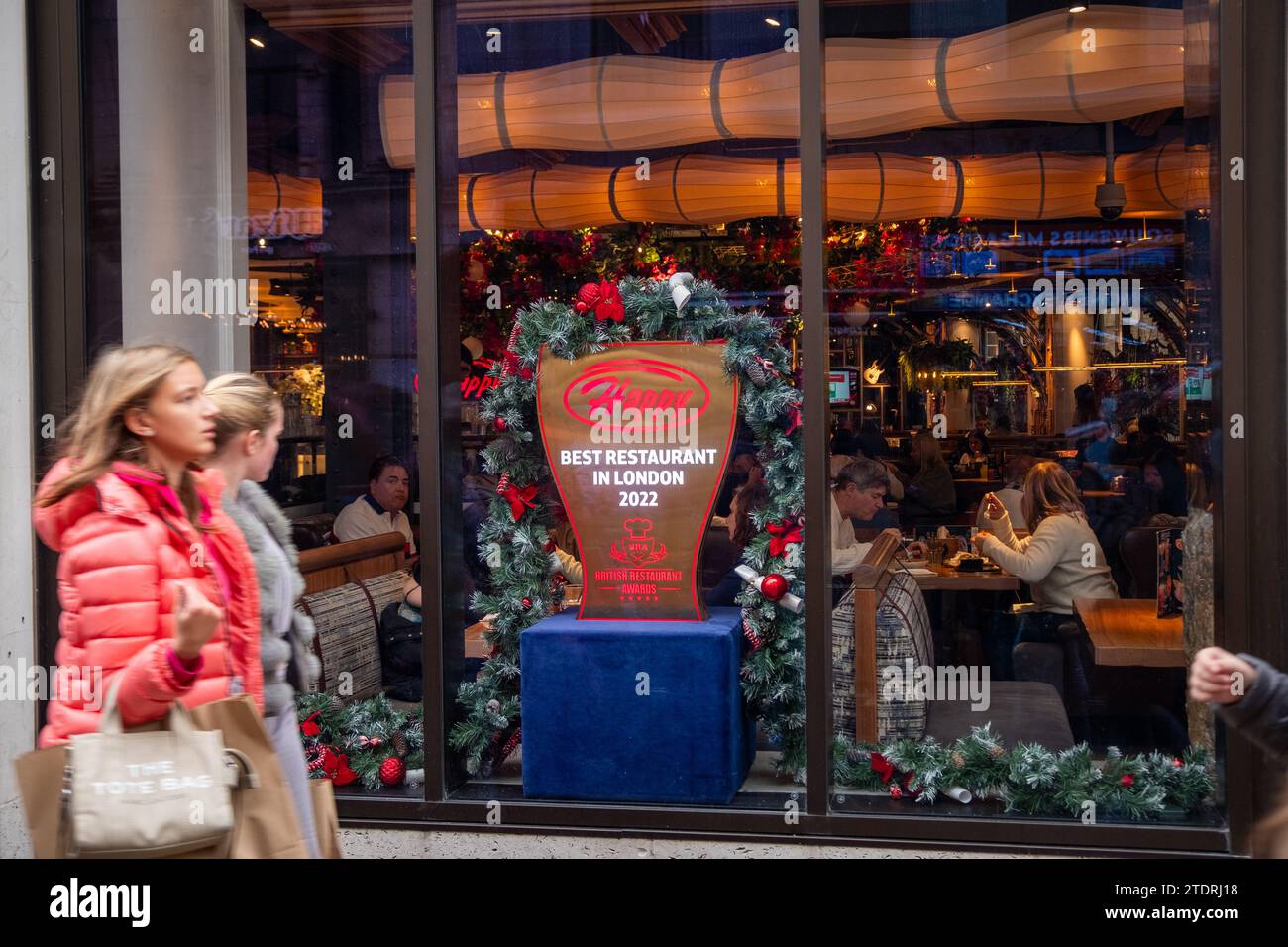 LONDON- DECEMBER 14, 2023: Happy restaurant off Piccadilly and ...