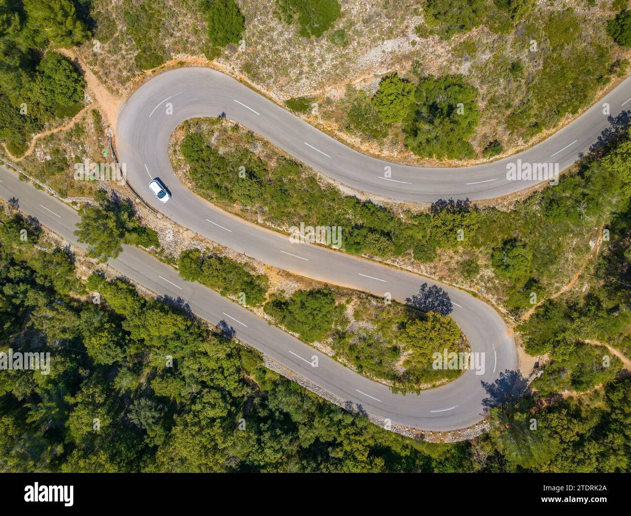 Aerial view of the curves of the road that goes up to the summit of ...