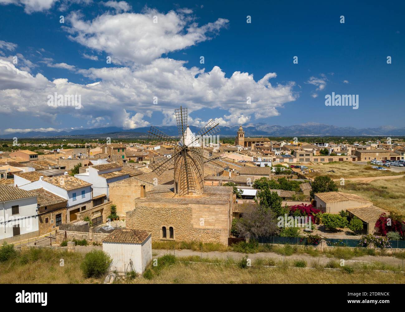 Aerial view of the town of Algaida and a traditional windmill. In the ...