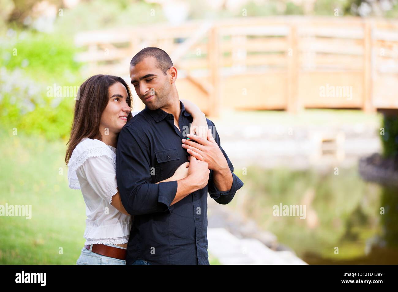 Couple enjoying their love at the park Stock Photo - Alamy