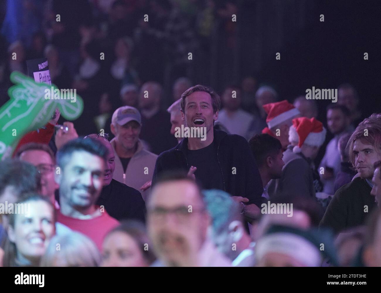 Former footballer Peter Crouch watches the darts on day five of the ...