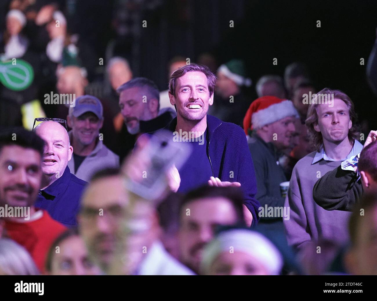 Former footballer Peter Crouch watches the darts on day five of the ...