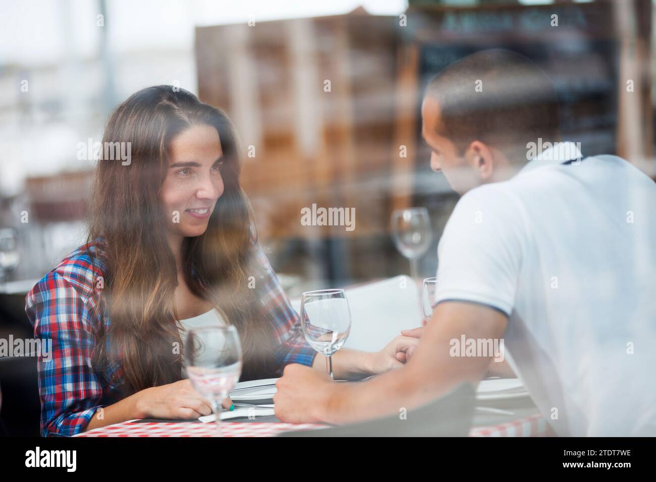 Couple enjoying their love at the restaurant Stock Photo - Alamy