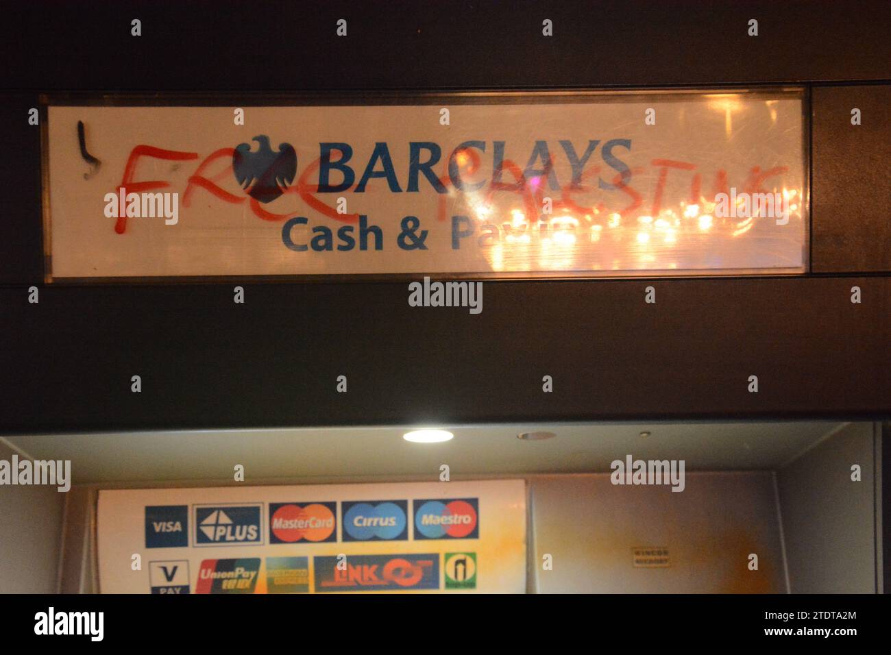 Free Palestine graffiti on the walls and cashpoints of Barclays Bank in ...
