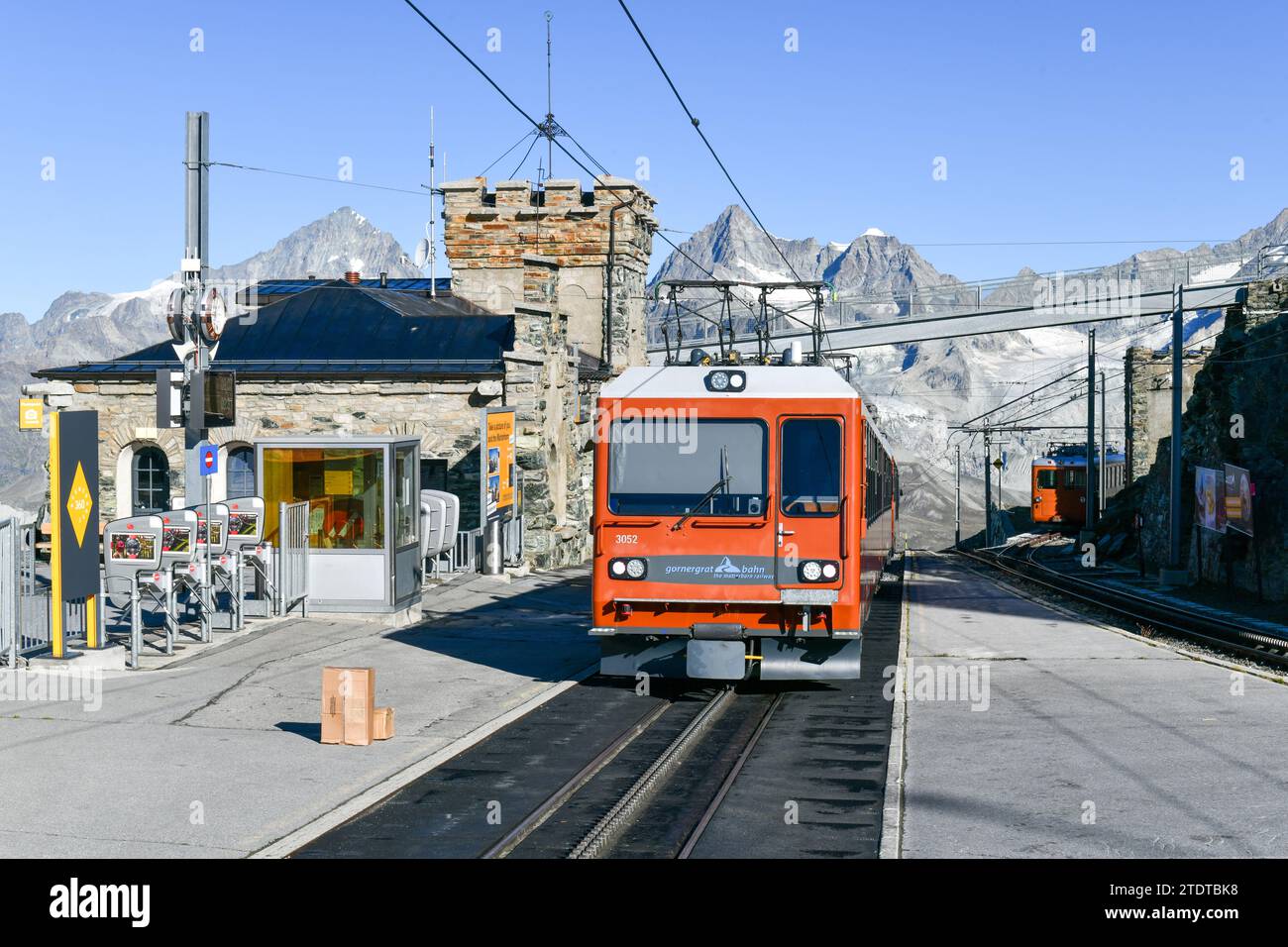 Gornergrat red tourist train with the Matterhorn peak panorama in Swiss ...