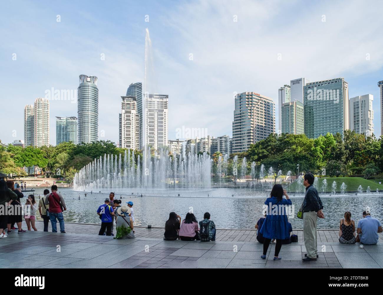 Kuala Lumpur, Malaysia - February 26th 2018: People watching the water ...