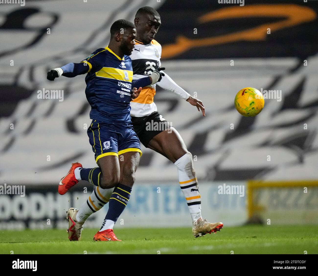 Emmanuel Latte Lath #9 of Middlesbrough breaks past Jesse Debrah #27 of ...