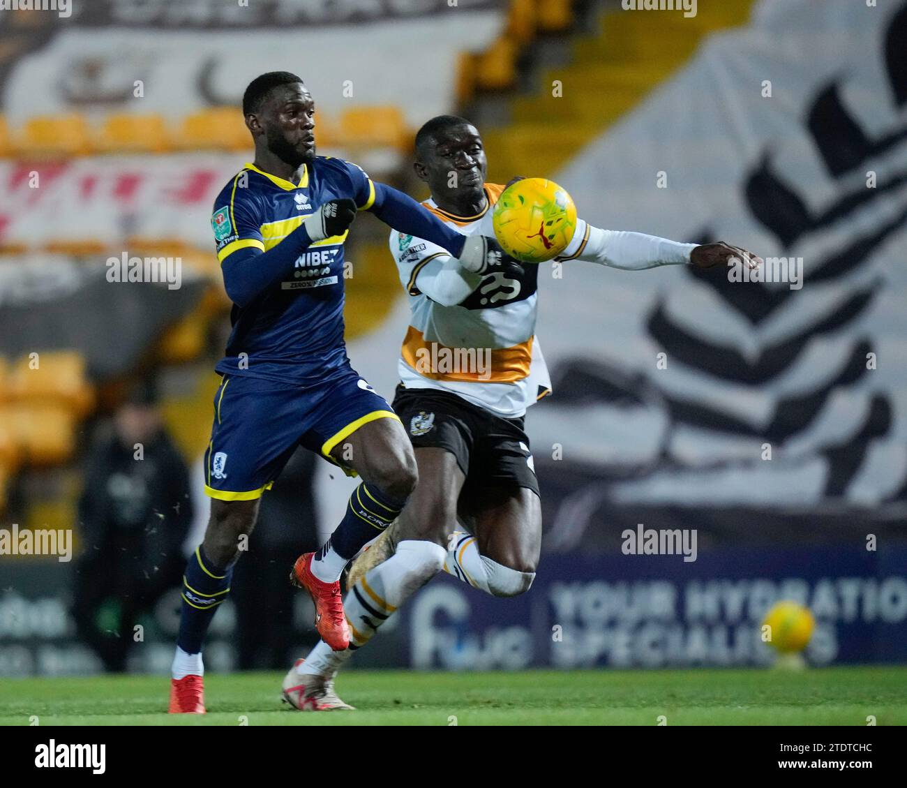 Emmanuel Latte Lath #9 of Middlesbrough breaks past Jesse Debrah #27 of ...