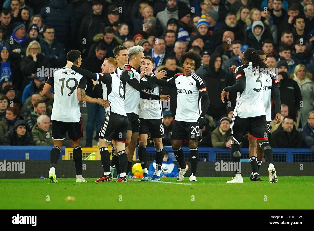 Fulham players celebrate their side's first goal of the game, scored by ...