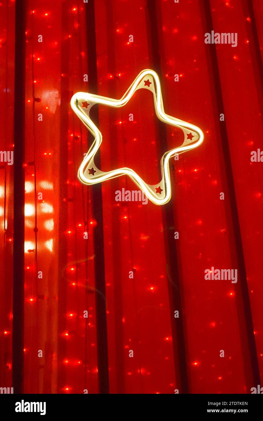 Closeup of a lighting Star on red Curtain. Background for event ...