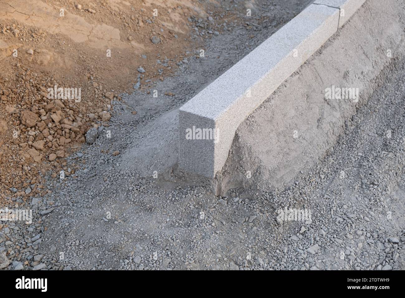 Concrete curb border laid on cement. road safety Pavement construction ...