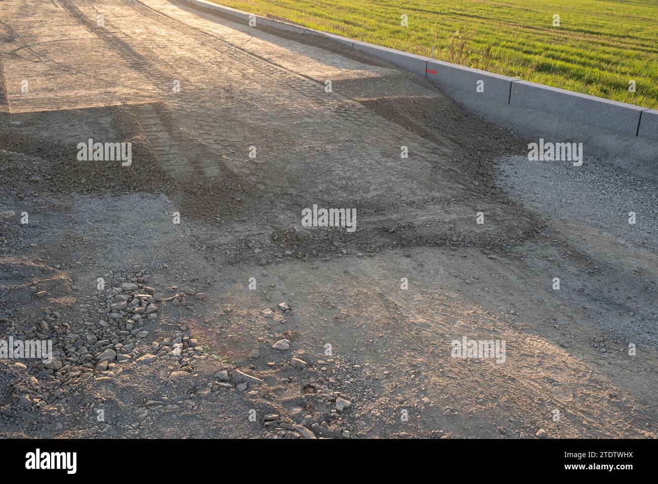 Concrete curb border laid on cement. road safety Pavement construction ...