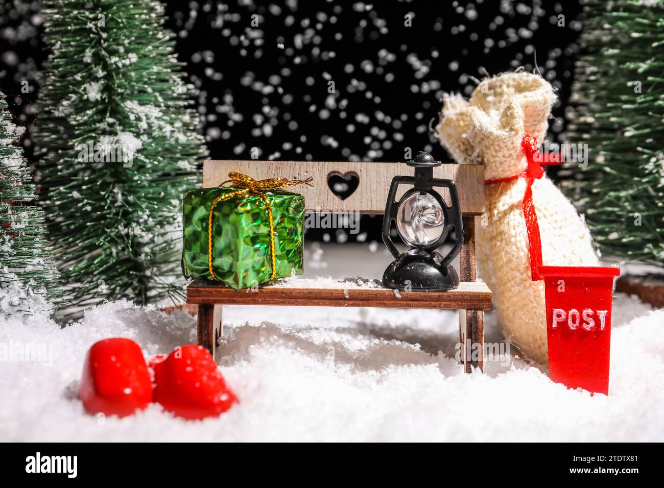Beautiful composition with bench, Christmas fir trees and different ...