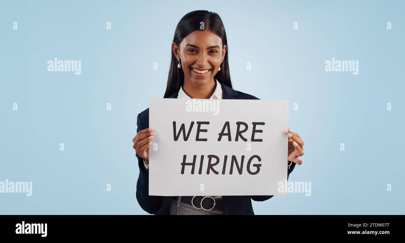 Business woman, portrait and hiring sign for advertising opportunity or ...