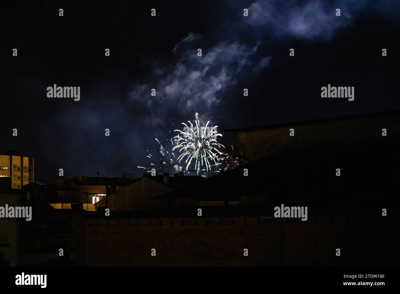 Fireworks explode over roof hi-res stock photography and images - Alamy