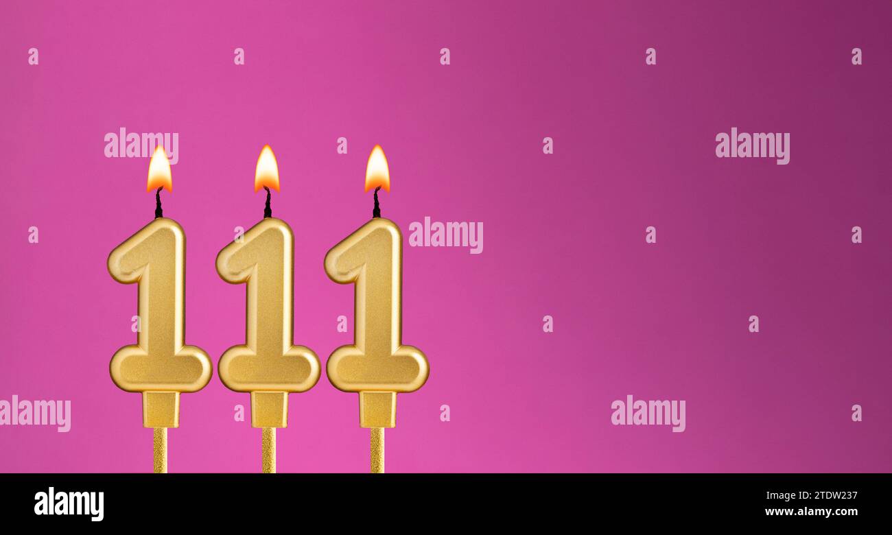 Candle number 111 in purple background - birthday card Stock Photo - Alamy