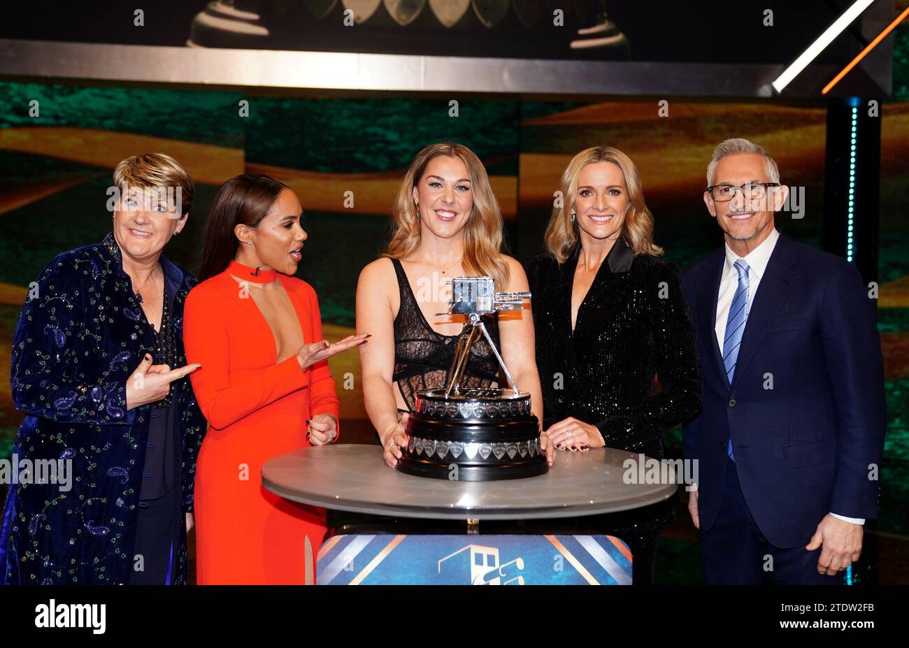 Mary Earps (centre) poses with the trophy after winning BBC Sports ...