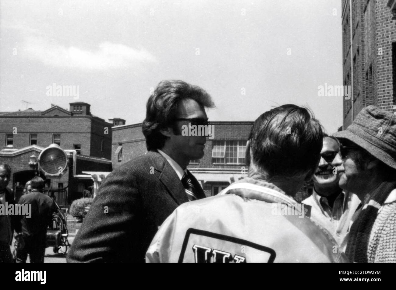 CLINT EASTWOOD and Director DON SIEGEL on set location candid photo in ...