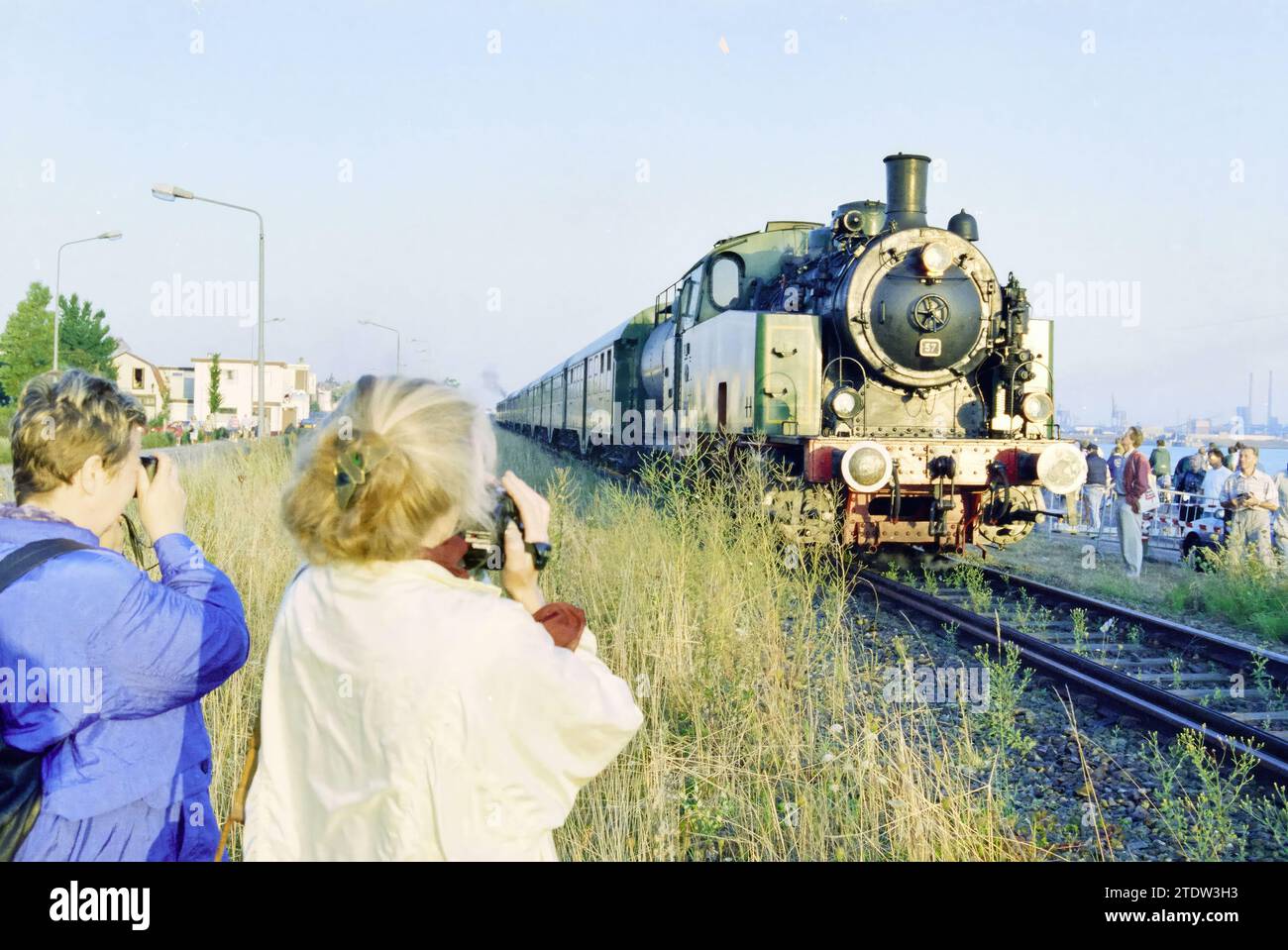 People view an old passenger train, Whizgle News from the Past ...