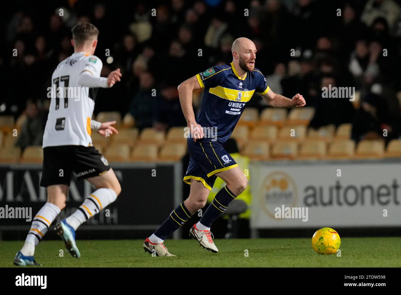 Matthew Clarke #5 of Middlesbrough rubs past Alfie Devine #11 of Port ...