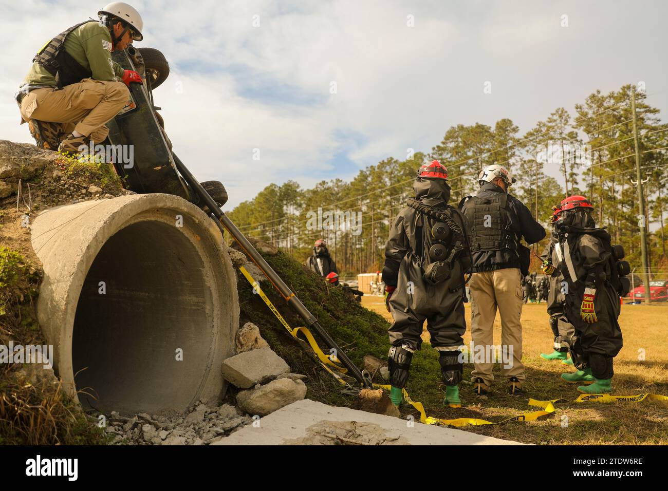 Soldiers assigned to the 83rd Chemical Battalion, assess a scenario ...