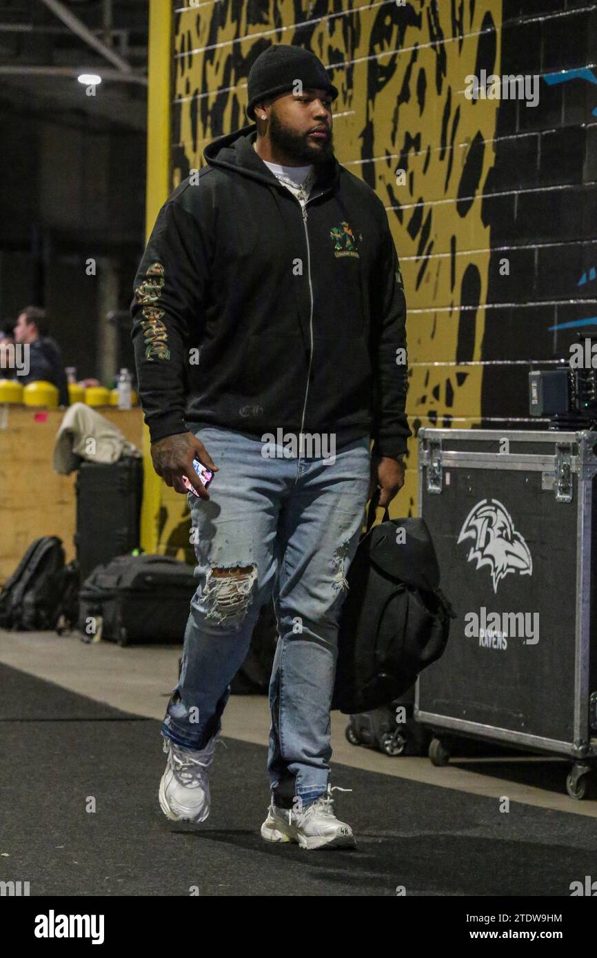 Baltimore Ravens defensive tackle Travis Jones (98) arrives at the ...