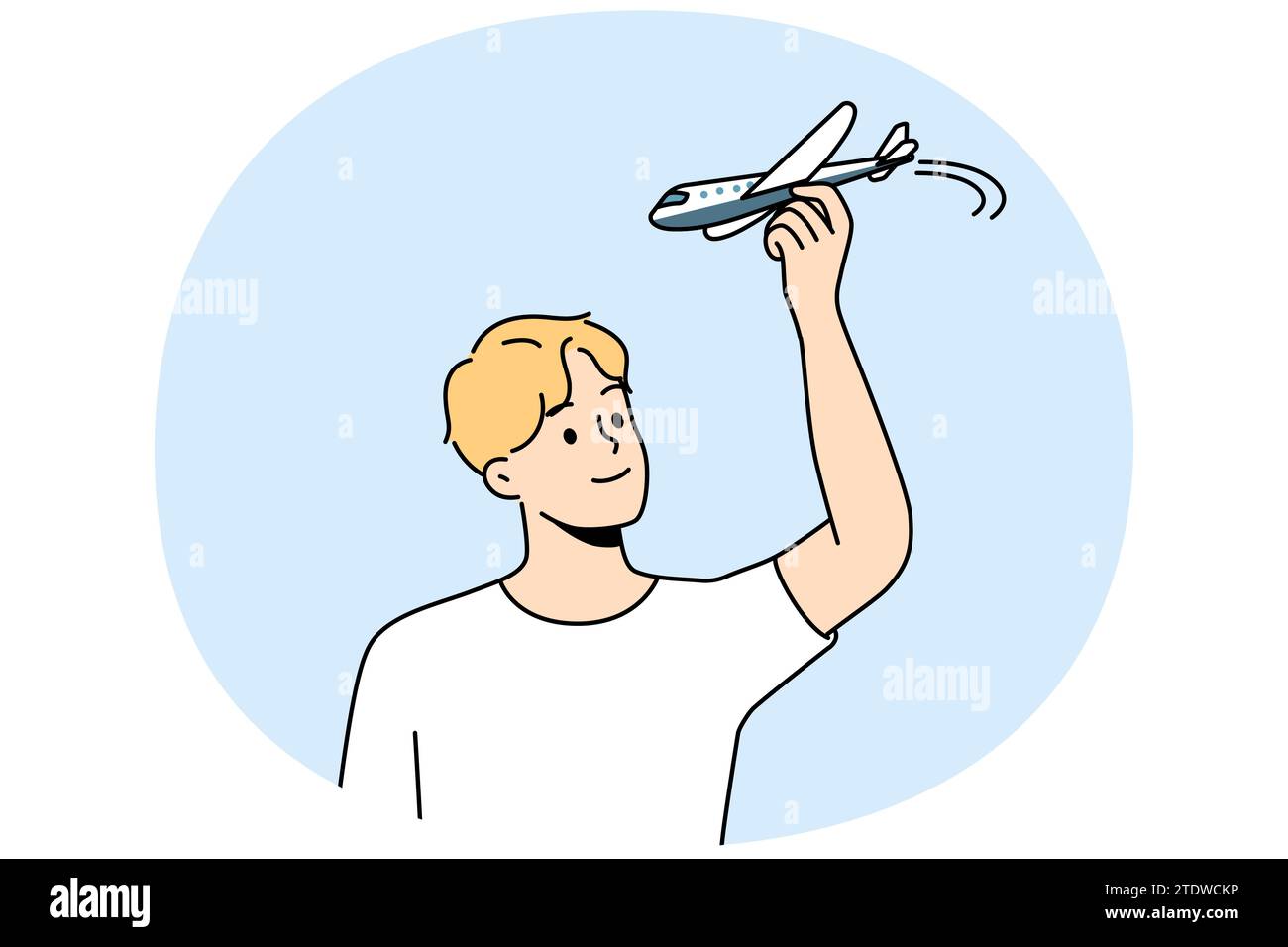 Young man have fun playing with airplane model. Smiling guy flying with ...