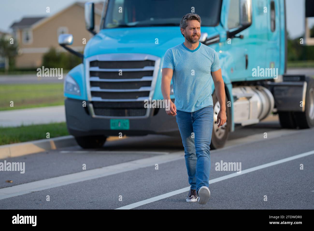 Men driver near lorry truck. Truck driver. Trucking owner ...