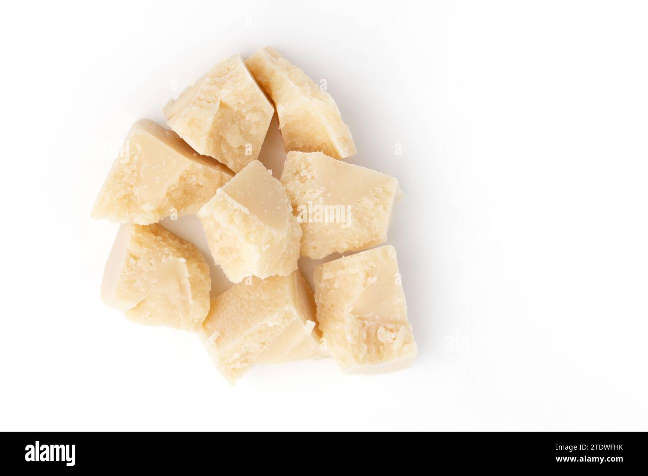 pieces of delicious parmesan cheese with empty space for text isolated ...