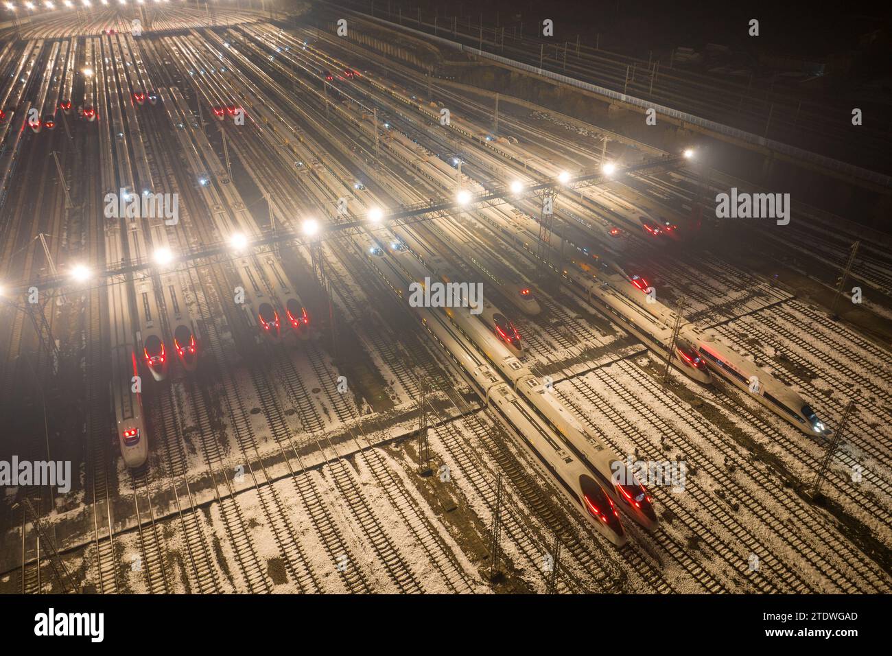 Nanjing, China. 20th Dec, 2023. NANJING, CHINA - DECEMBER 20, 2023 - The high-speed trains with ...