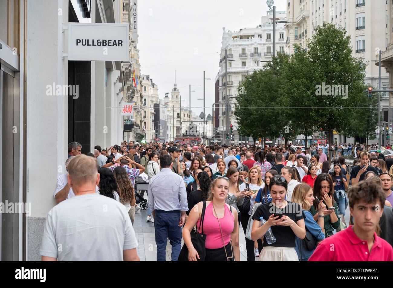 Madrid, Spain. 17th Sep, 2023. Shoppers and pedestrians walk past the ...
