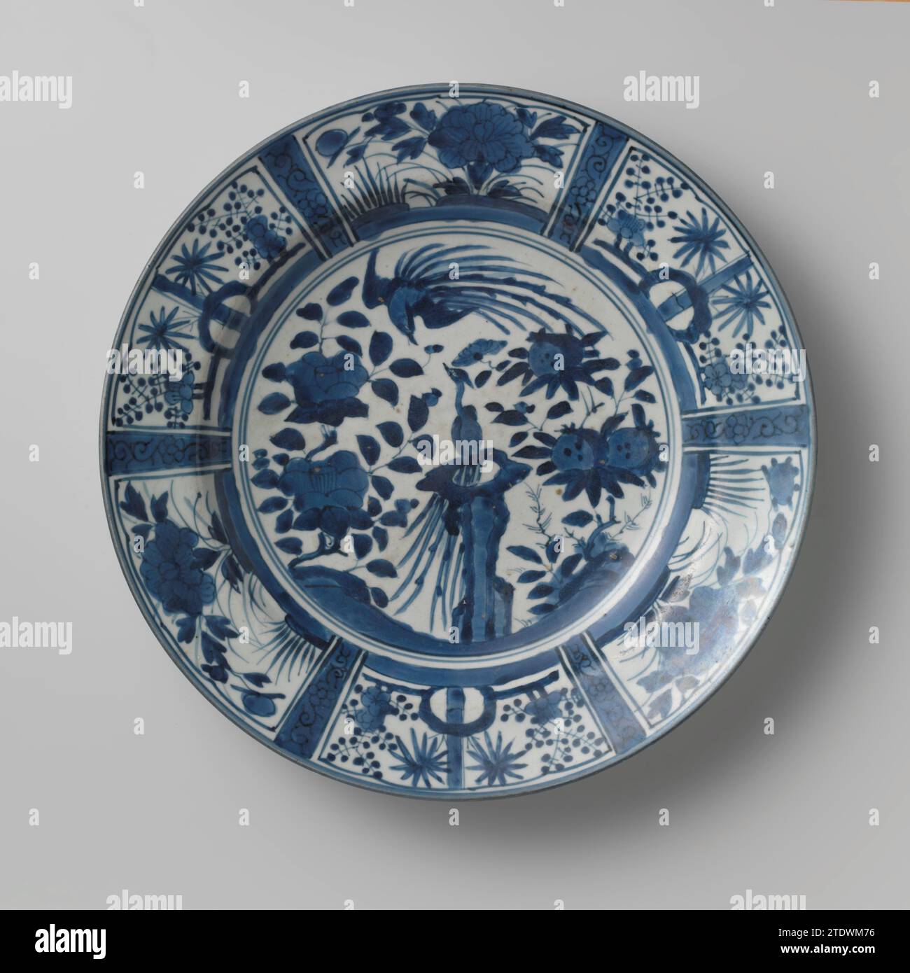Dish with two hoo-birds near rocks and flowering plants, anonymous, c ...