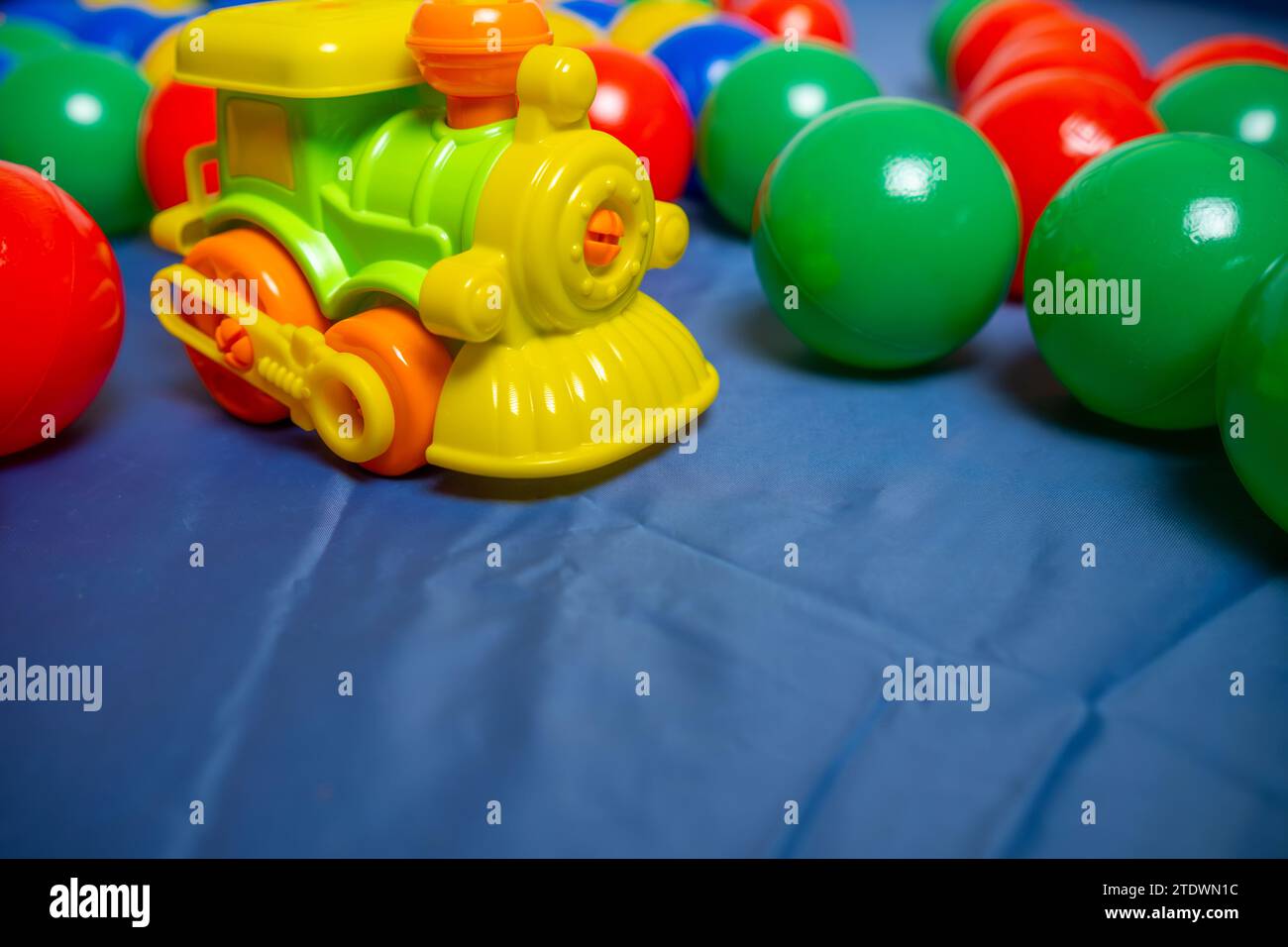 Toy train for kids with colored balls. Bright children's toys Stock ...