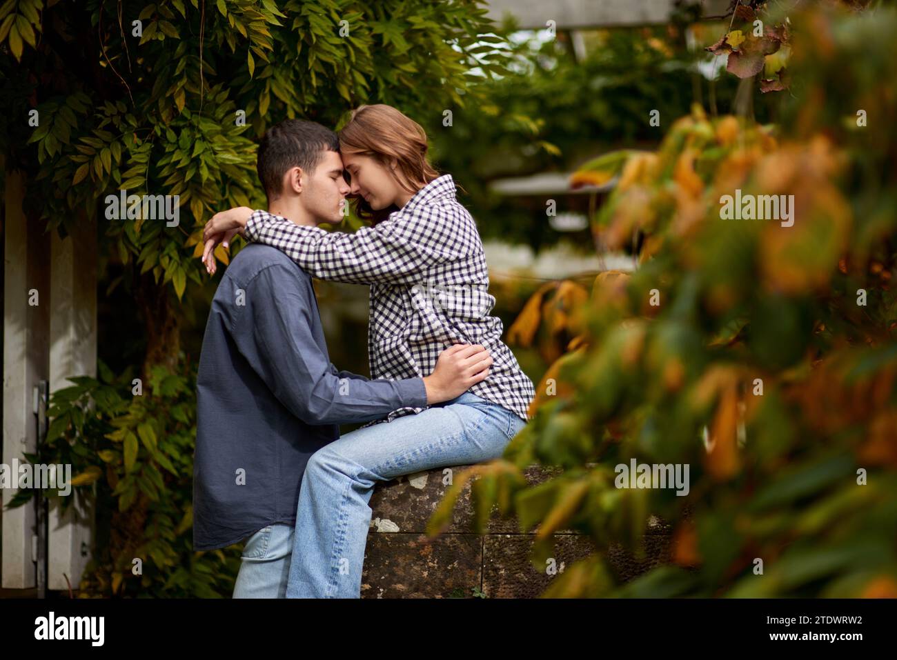 Love's Moments: A Young Cute Female Hugs Her Boyfriend in the ...