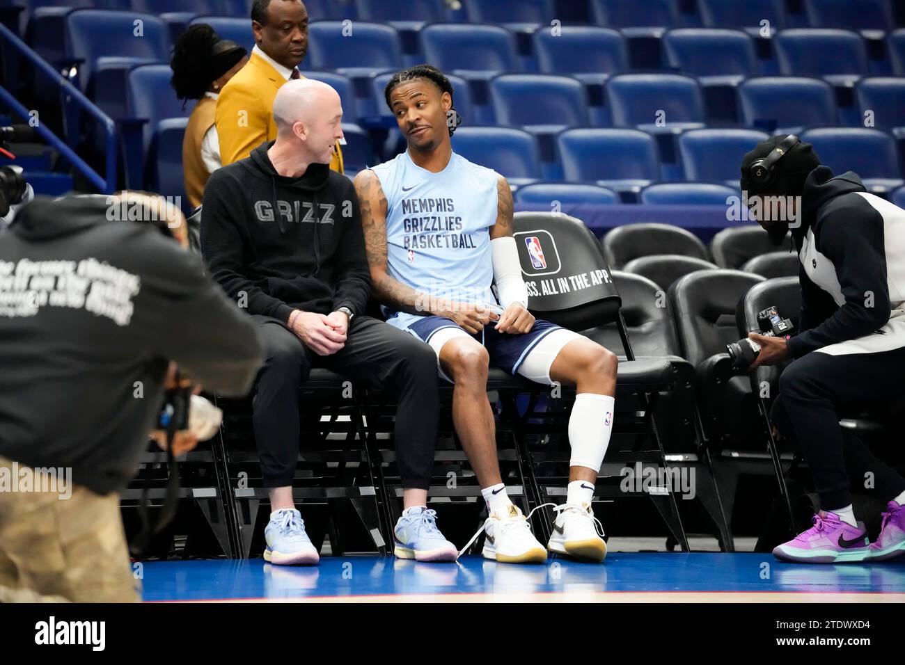 Memphis Grizzlies guard Ja Morant talks to assistant coach Blake Ahearn ...