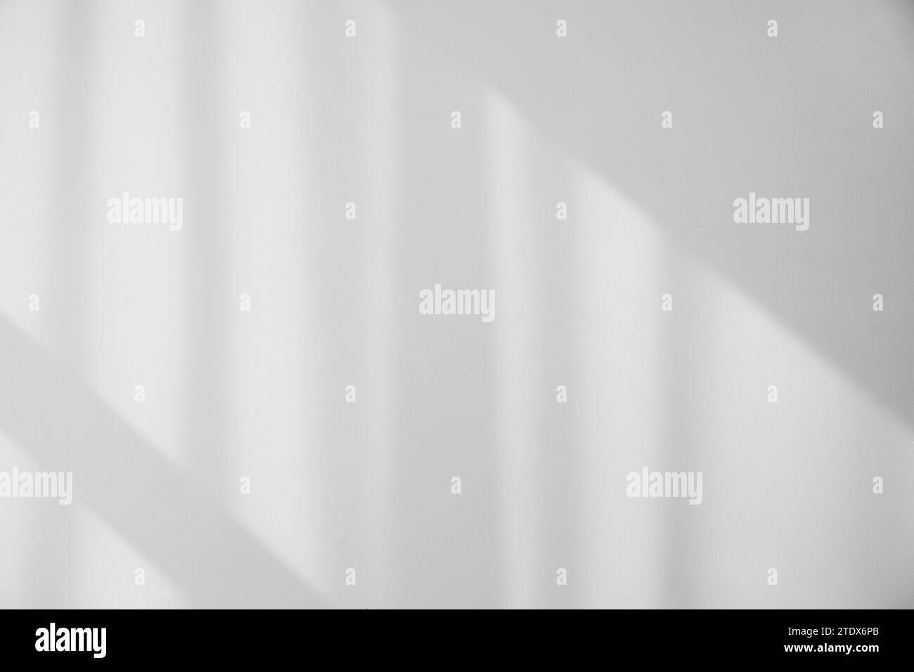 Shadow from window and curtains on white wall indoors Stock Photo - Alamy