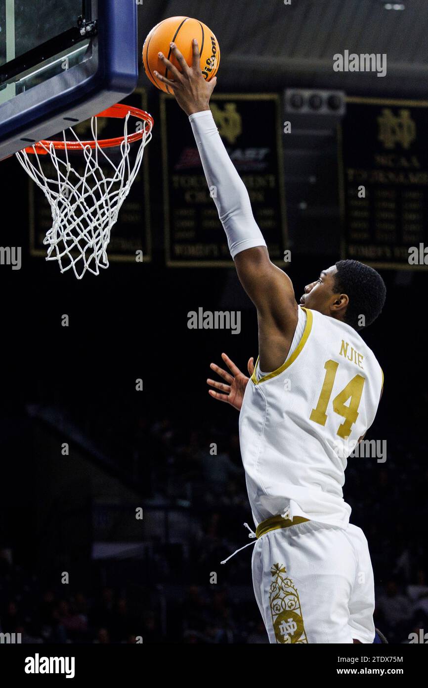 December 19, 2023: Notre Dame forward Kebba Njie (14) goes up for a ...