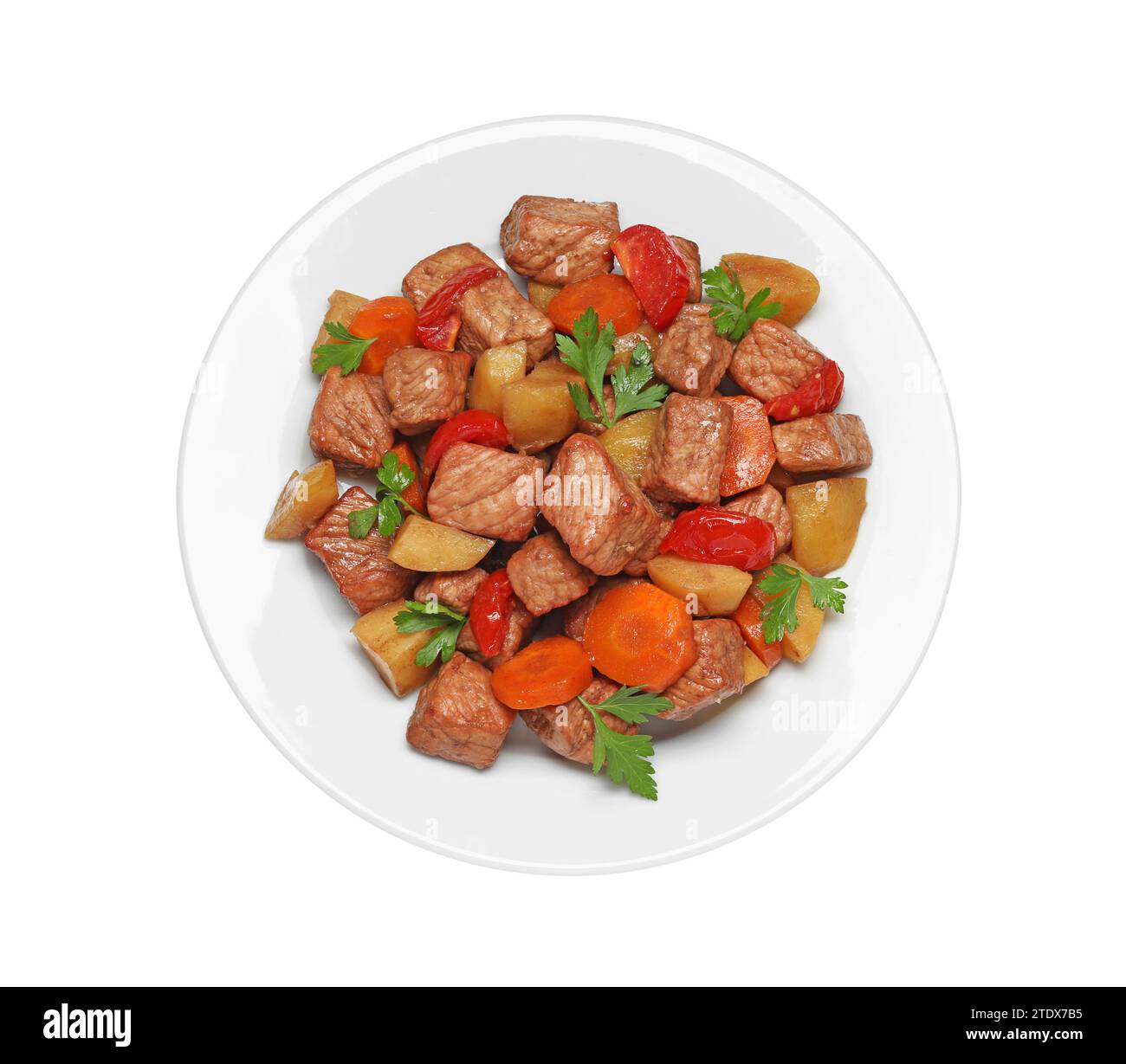 Plate with delicious goulash isolated on white, top view Stock Photo ...