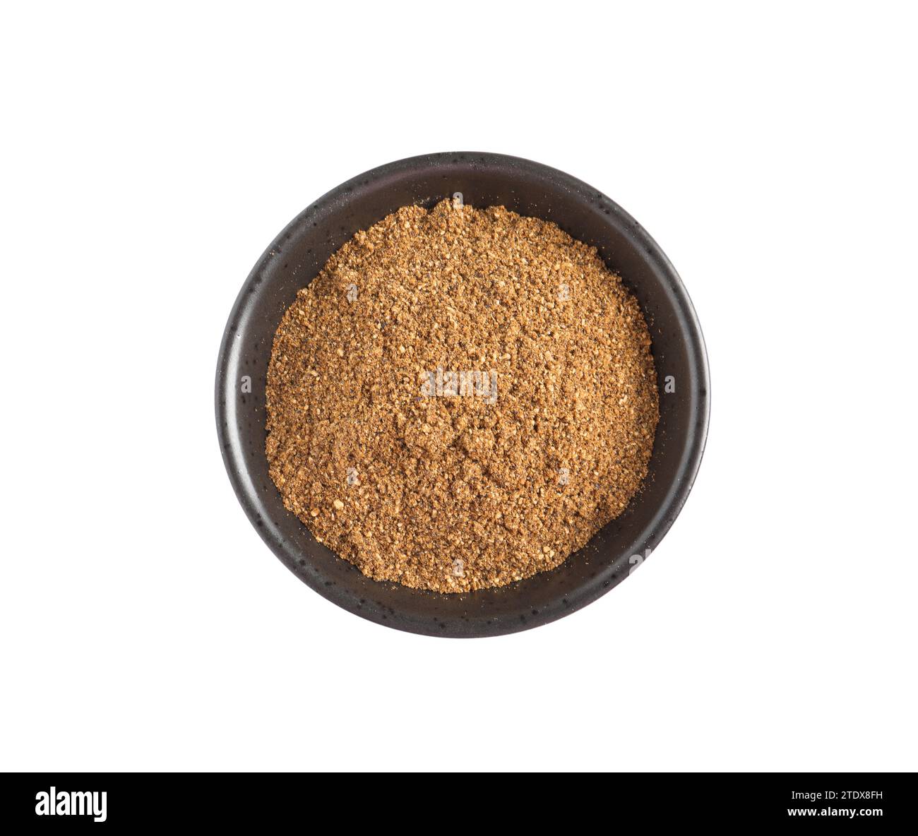 Bowl of aromatic caraway (Persian cumin) powder isolated on white, top ...