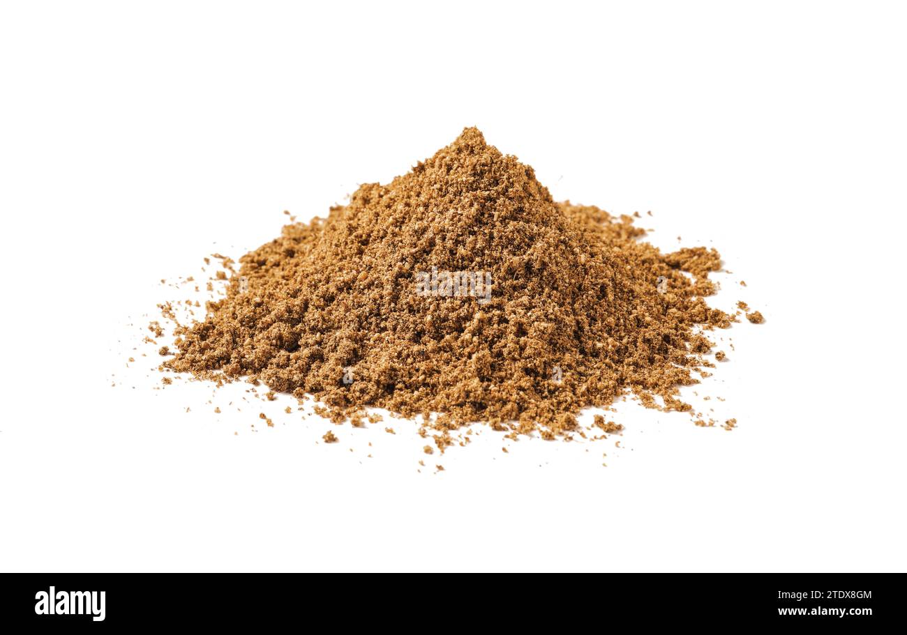 Heap of aromatic caraway (Persian cumin) powder isolated on white Stock ...