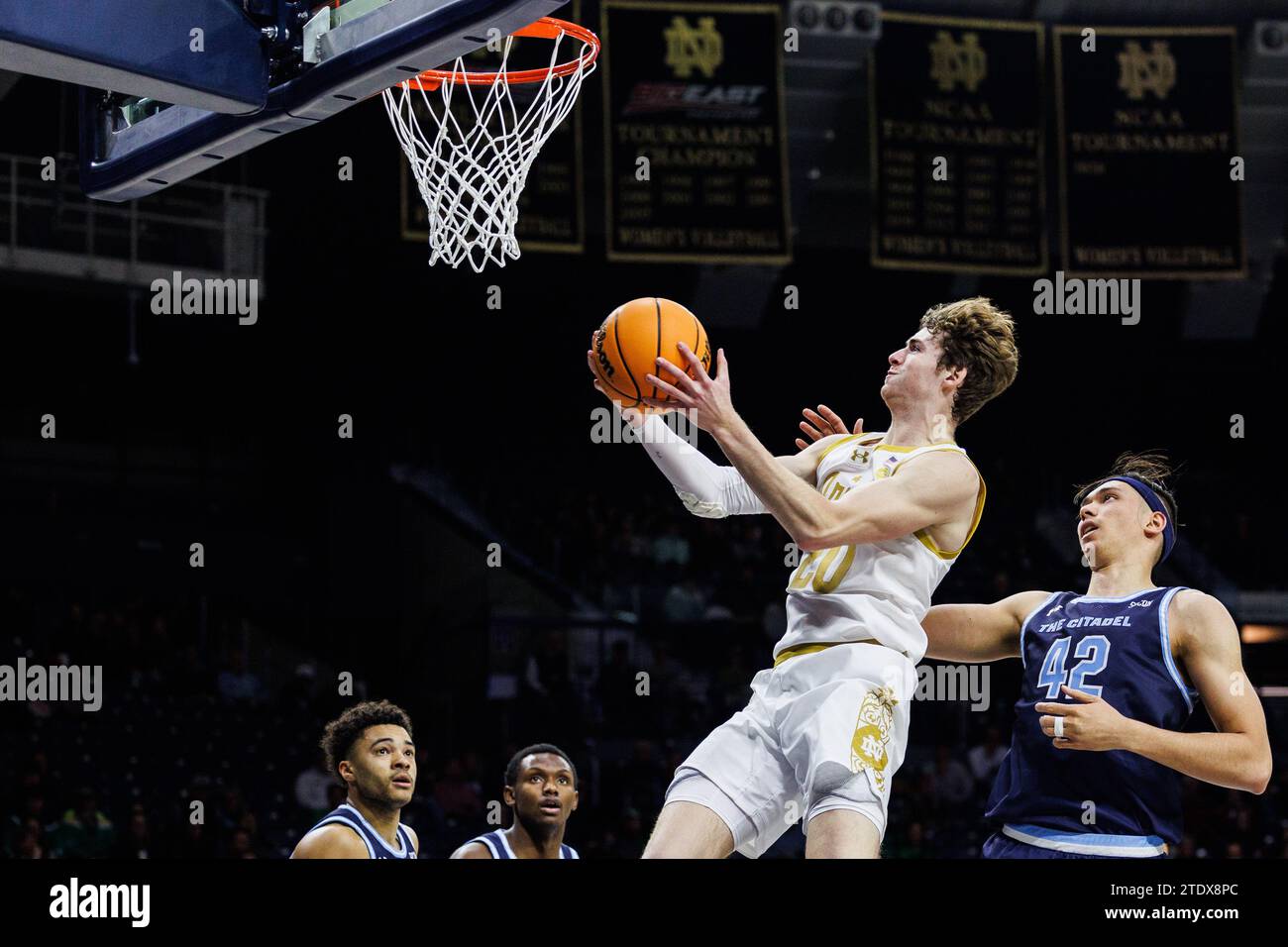 December 19, 2023: Notre Dame guard J.R. Konieczny (20) goes up for a ...