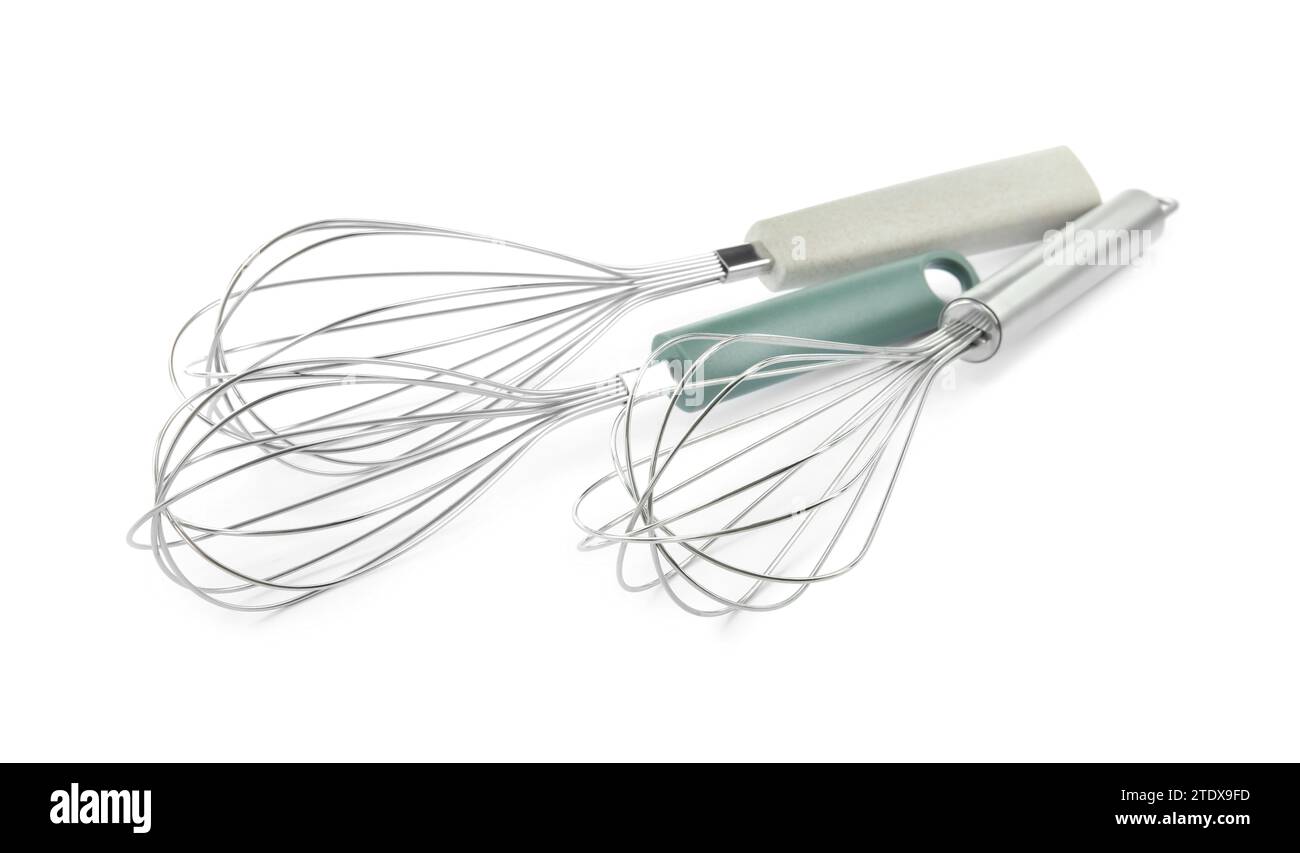 Different metal whisks isolated on white. Kitchen utensils Stock Photo ...