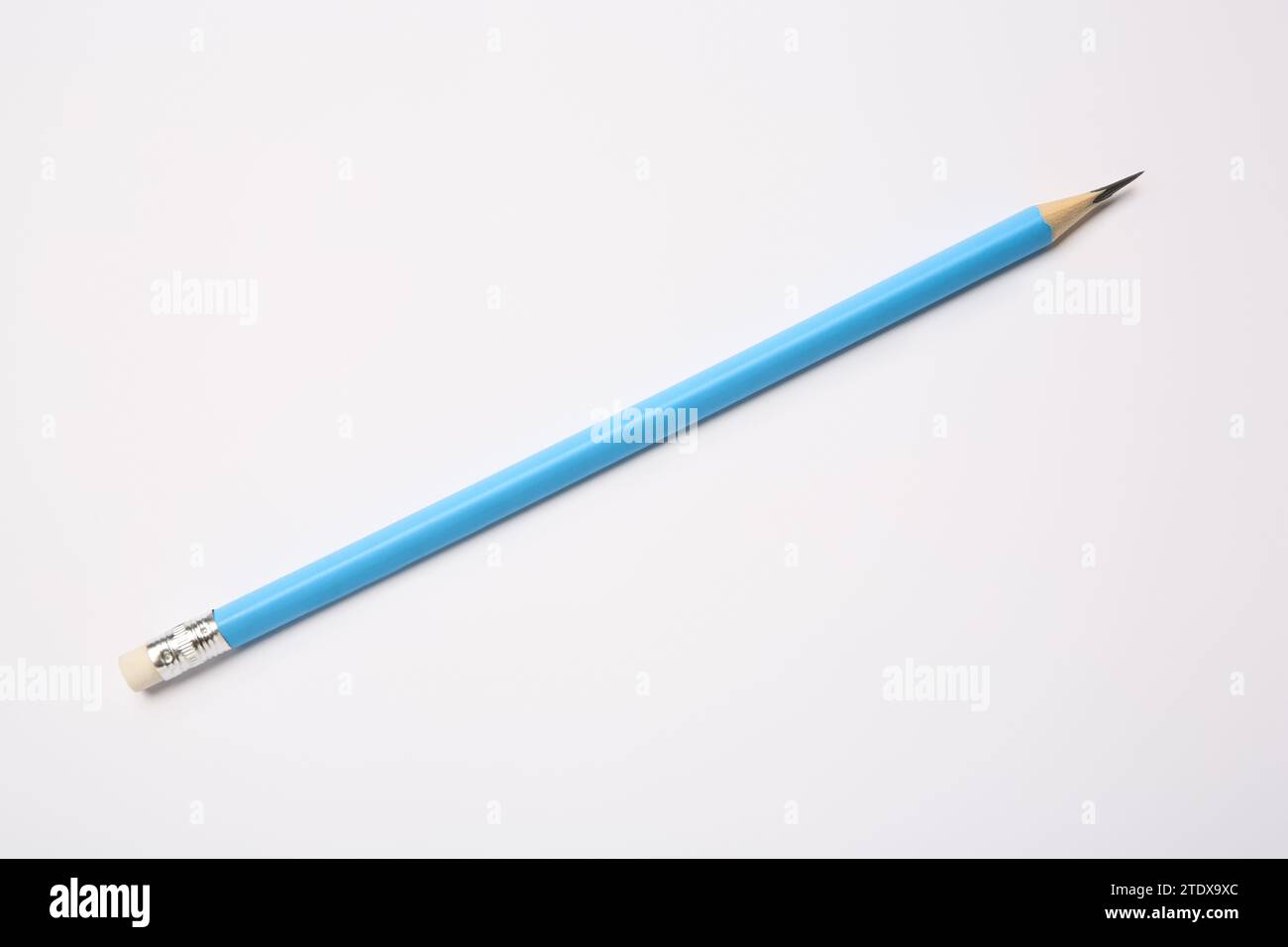 Sharp graphite pencil on white background, top view Stock Photo - Alamy