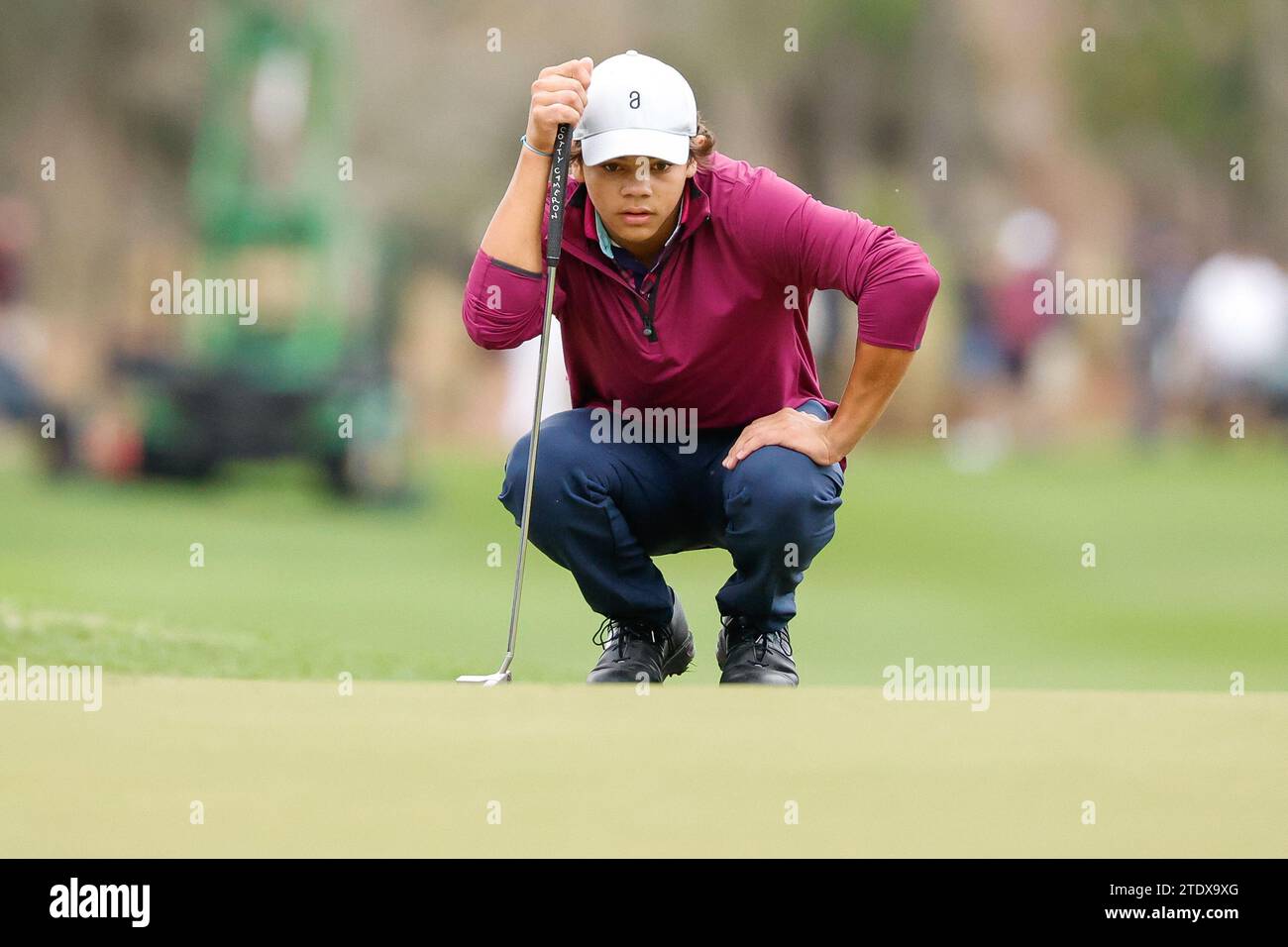Orlando, Florida, USA. 17th Dec, 2023. Charlie Woods reading a putt during Final Round of the ...