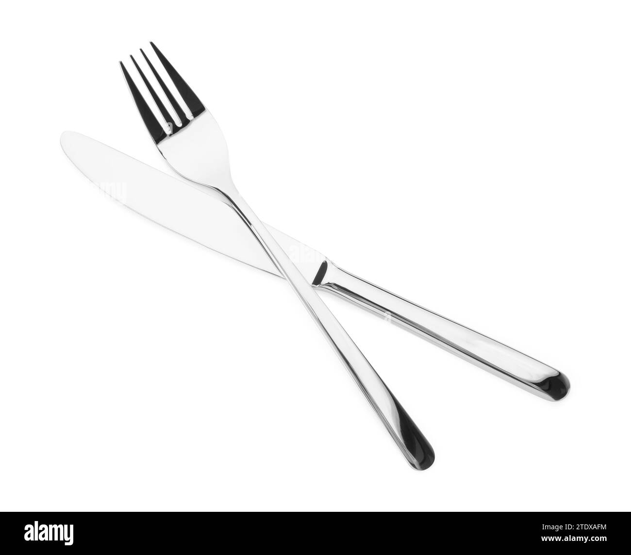 Shiny silver fork and knife isolated on white. Luxury cutlery Stock ...