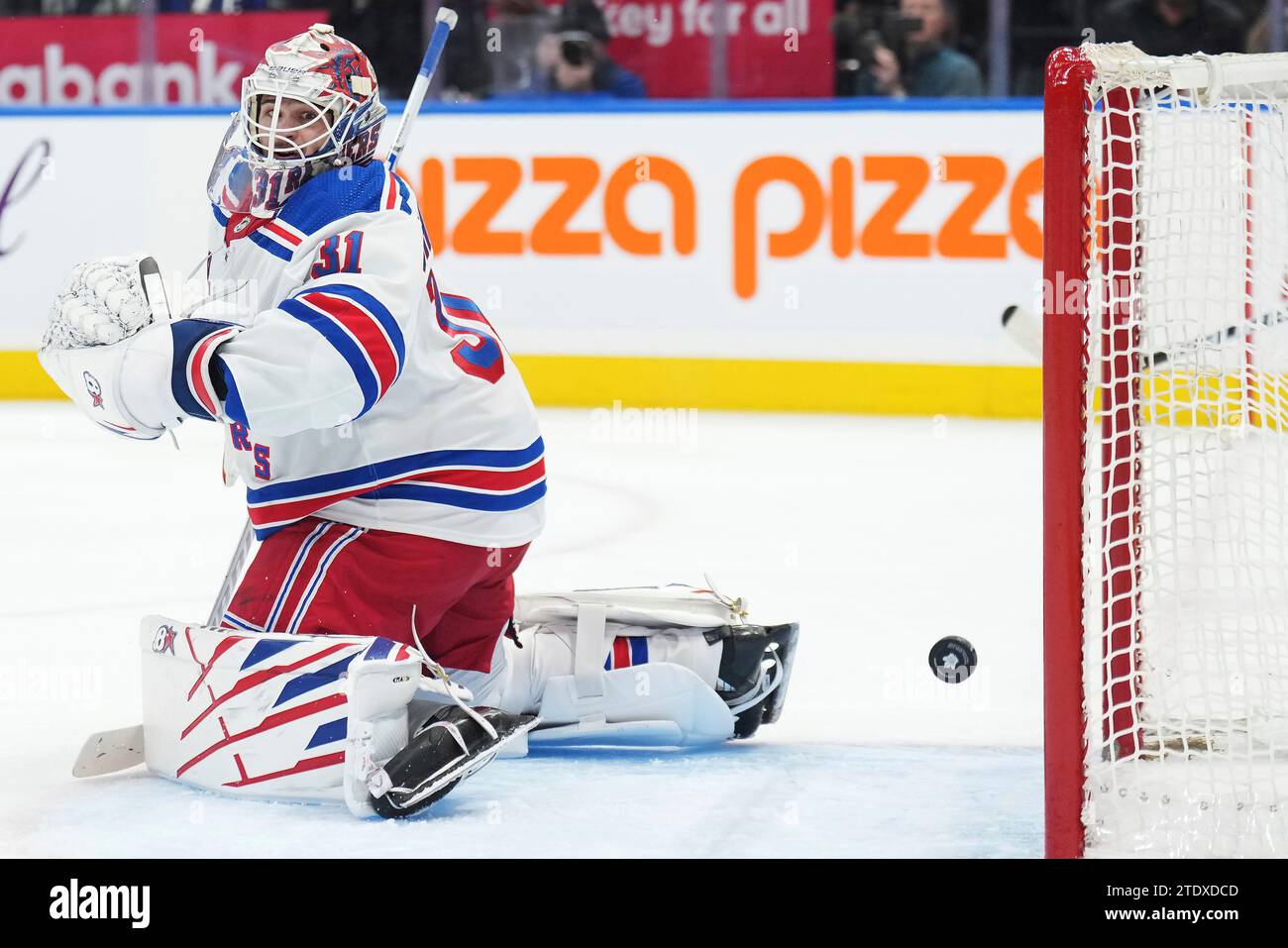 New York Rangers goaltender Igor Shesterkin looks back at a goal by ...